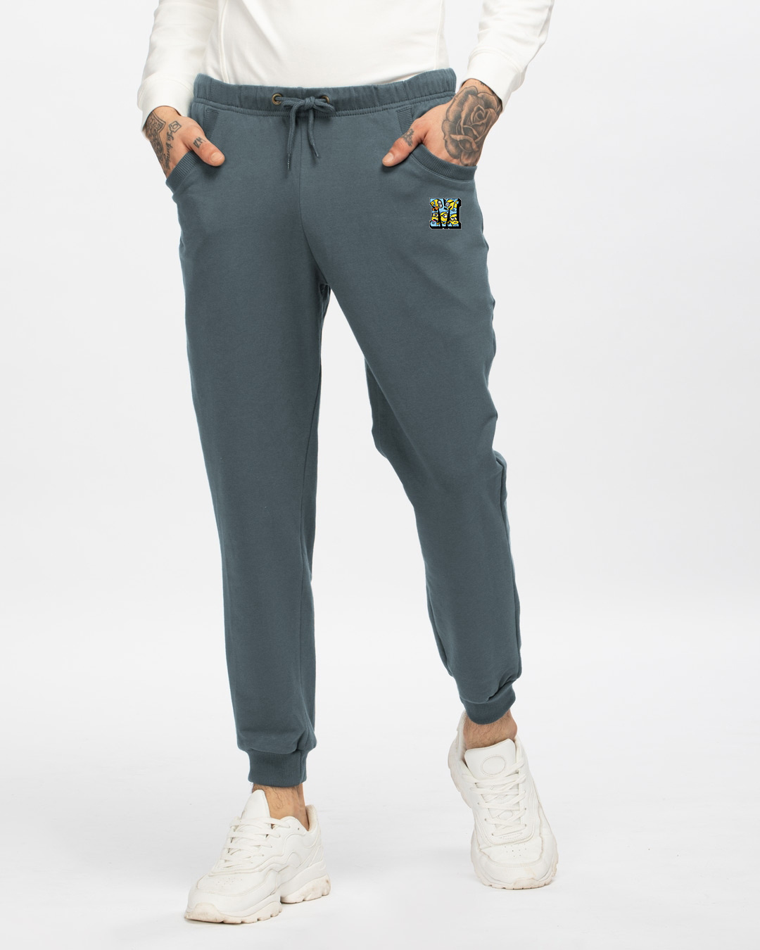 Buy Men's Blue Minion Badge Printed Joggers Online at Bewakoof
