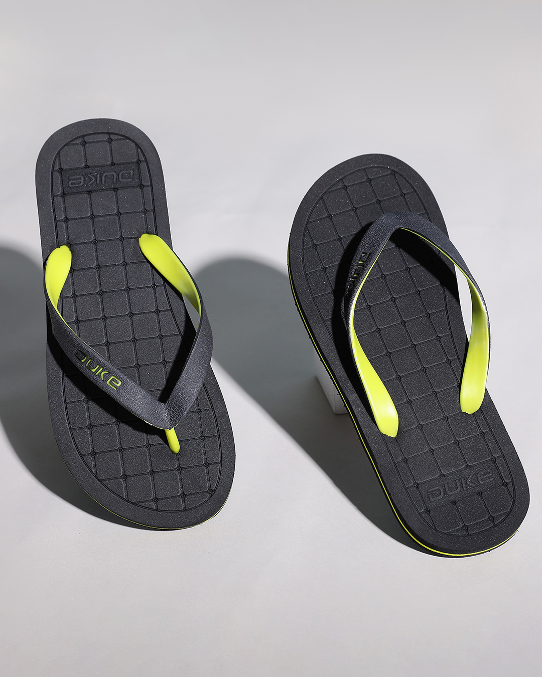 Buy Men's Black Checked Flip Flops Online in India at Bewakoof