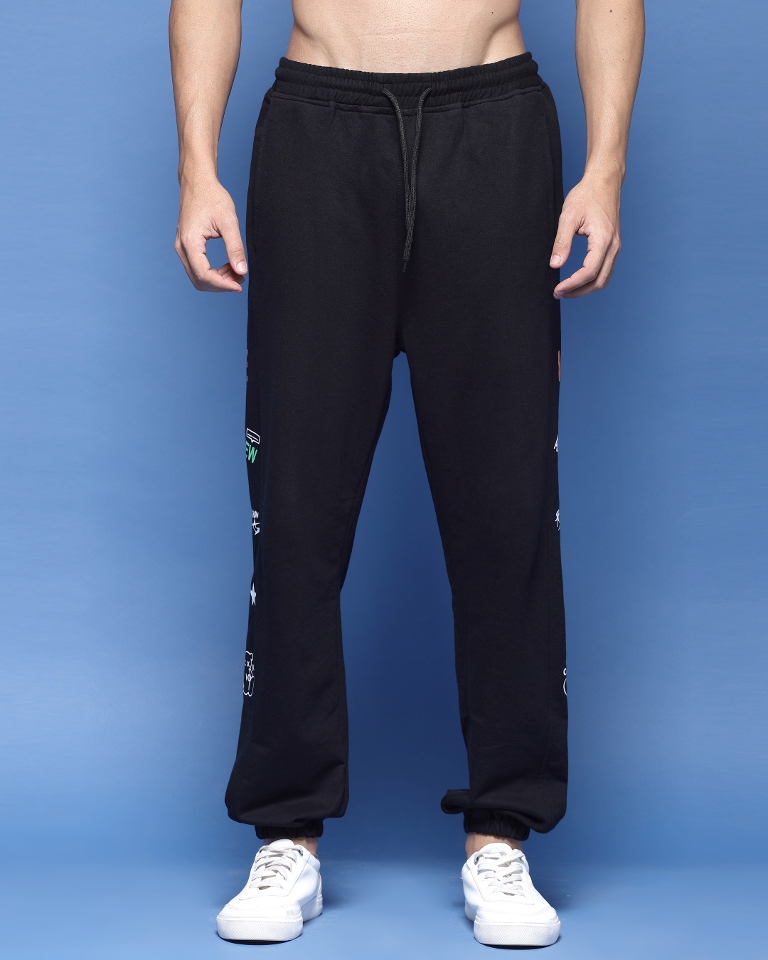 Buy Men's Black Graphic Printed Relaxed Fit Joggers Online at Bewakoof