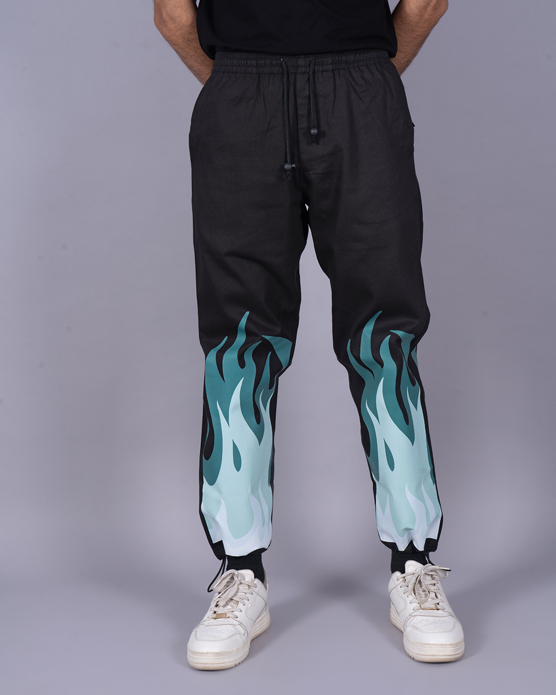 Buy Men's Black & Green Fire Printed Oversized Parachute Pants Online ...