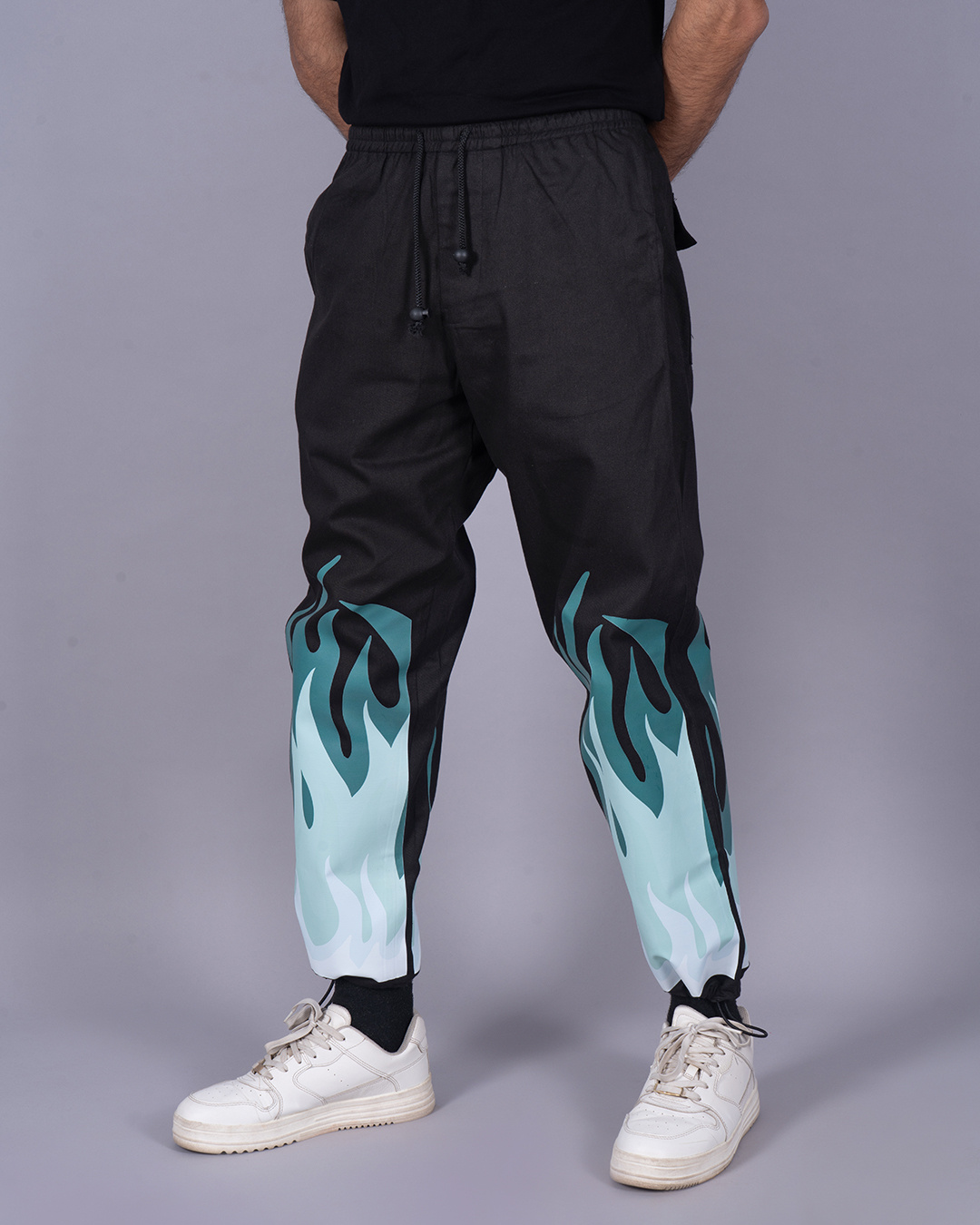 Buy Men's Black & Green Fire Printed Oversized Parachute Pants Online ...