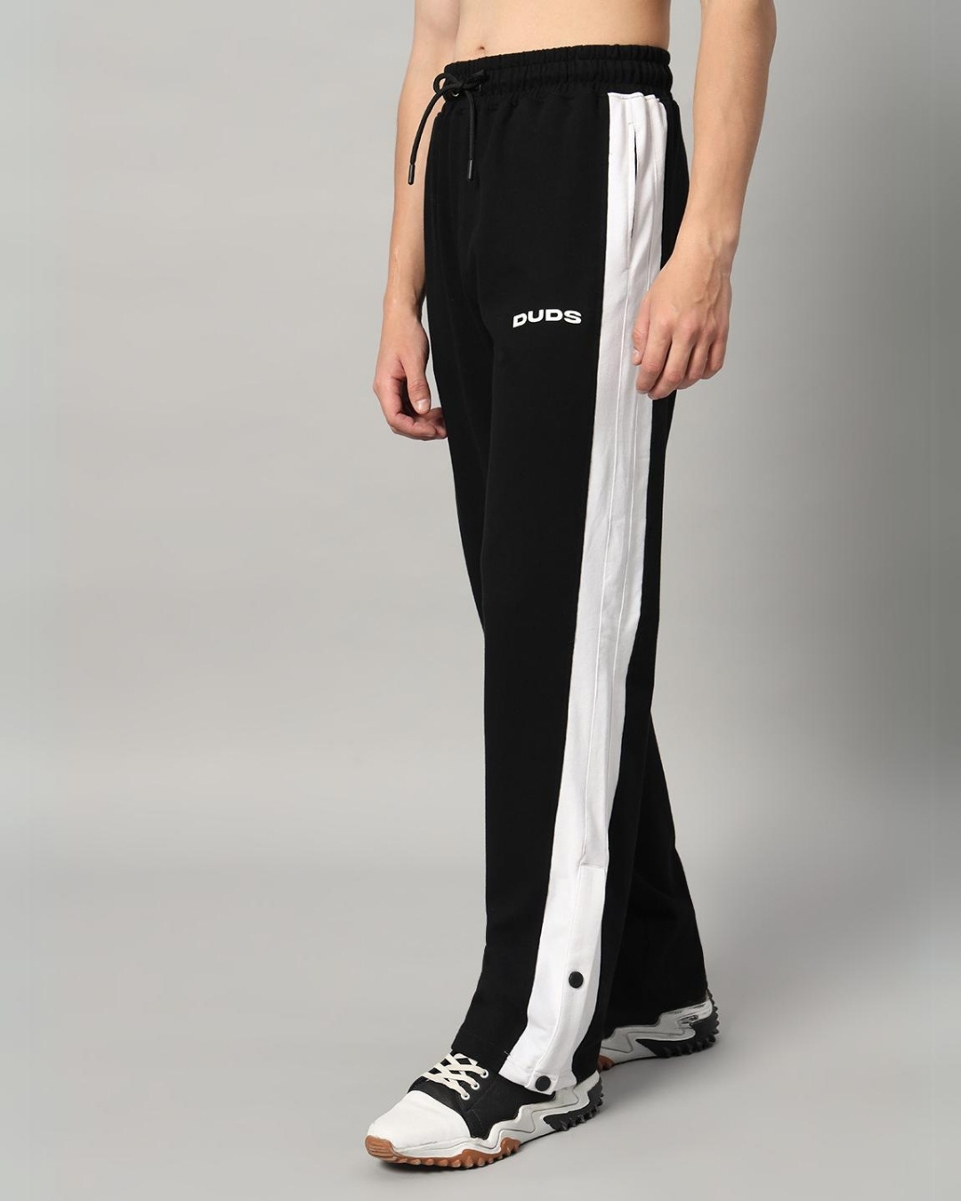 Buy Men's Black Side Panel Relaxed Fit Trackpants Online at Bewakoof