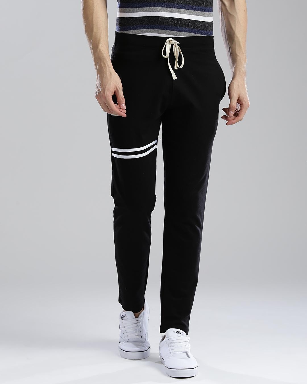Buy Men's Black Striped Track Pants Online at Bewakoof