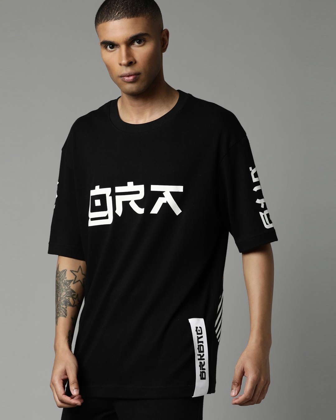 Buy Men's Black Typography Oversized Fit T-shirt Online at Bewakoof