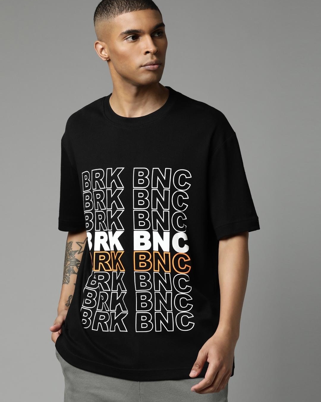 Buy Men's Black Typography Oversized Fit T-shirt Online at Bewakoof