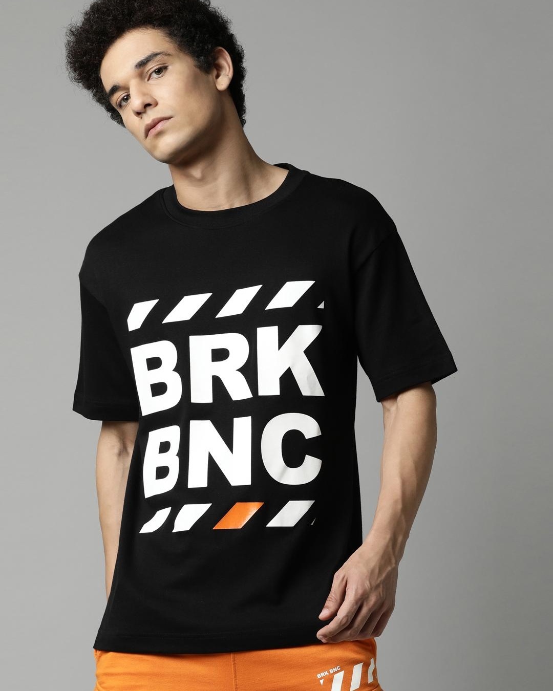 Buy Men's Black Typography Oversized Fit T-shirt Online at Bewakoof