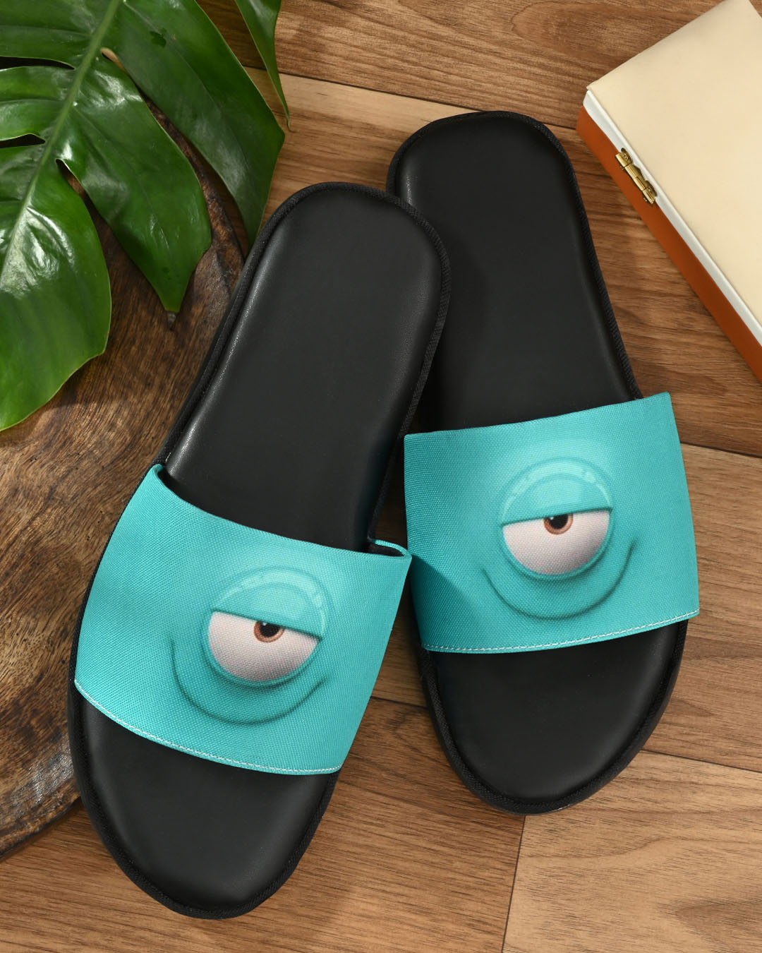 Buy Men's Blue Cartoon Eye Printed Sliders Online in India at Bewakoof