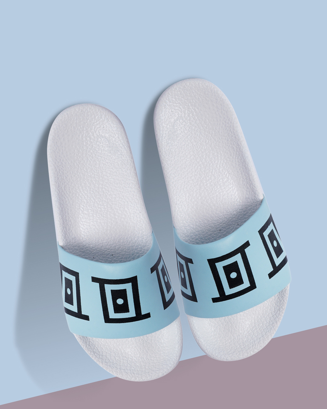 Buy Men's Blue Printed Lightweight Sliders Online in India at Bewakoof