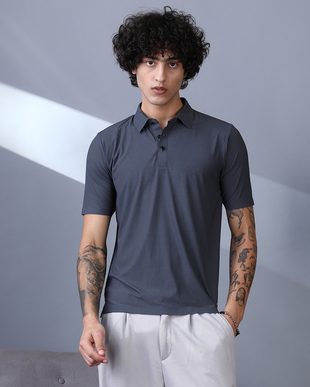 Buy Men's Charcoal Grey Textured Polo T-shirt Online at Bewakoof