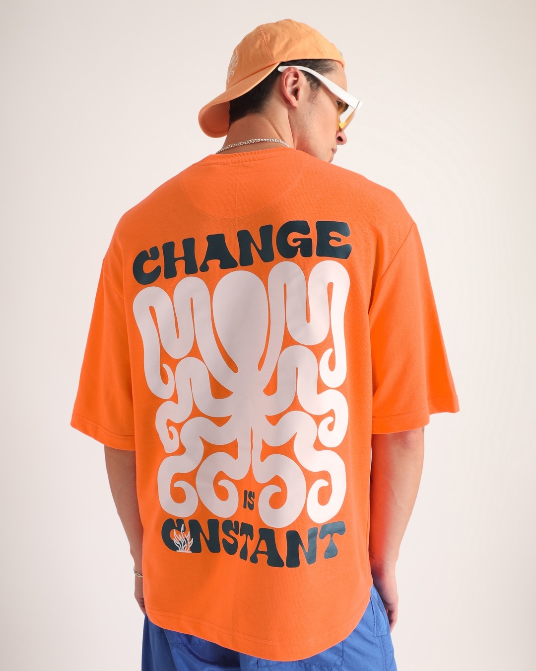 Buy Men's Neon Orange Graphic Printed Oversized T-Shirt Online at Bewakoof