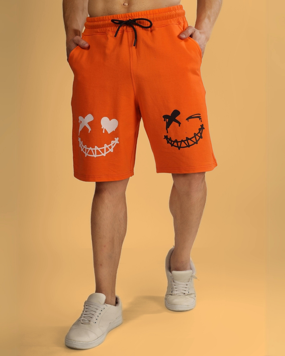 Buy Men's Orange Evil Smile Graphic Printed Relaxed Fit Shorts Online ...