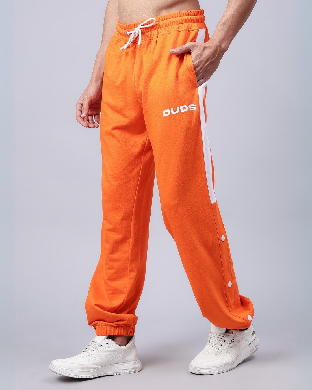 Buy Men's Orange Side Panel Relaxed Fit Jogger Pants Online at Bewakoof