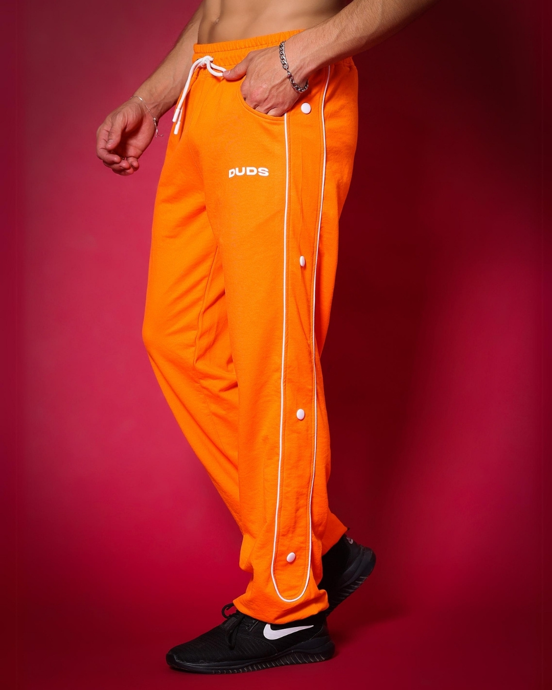 Buy Men's Orange Side Panel Relaxed Fit Joggers Online at Bewakoof