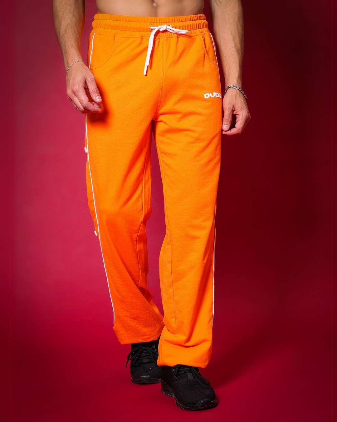 Buy Men's Orange Side Panel Relaxed Fit Joggers Online at Bewakoof