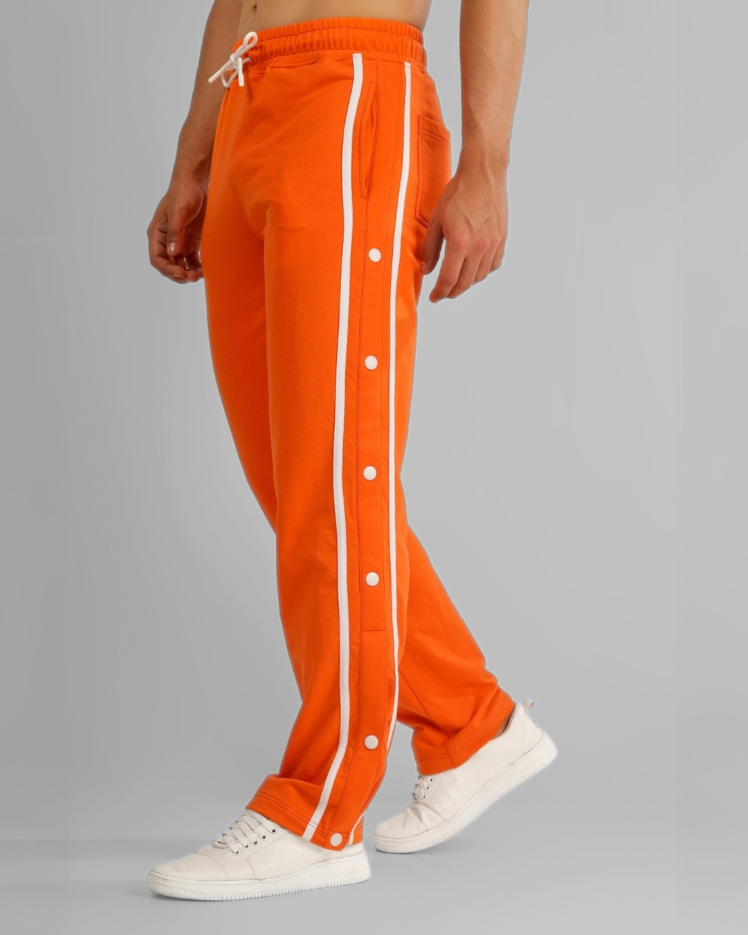 Buy Men's Orange Side Panel Relaxed Fit Trackpants Online at Bewakoof