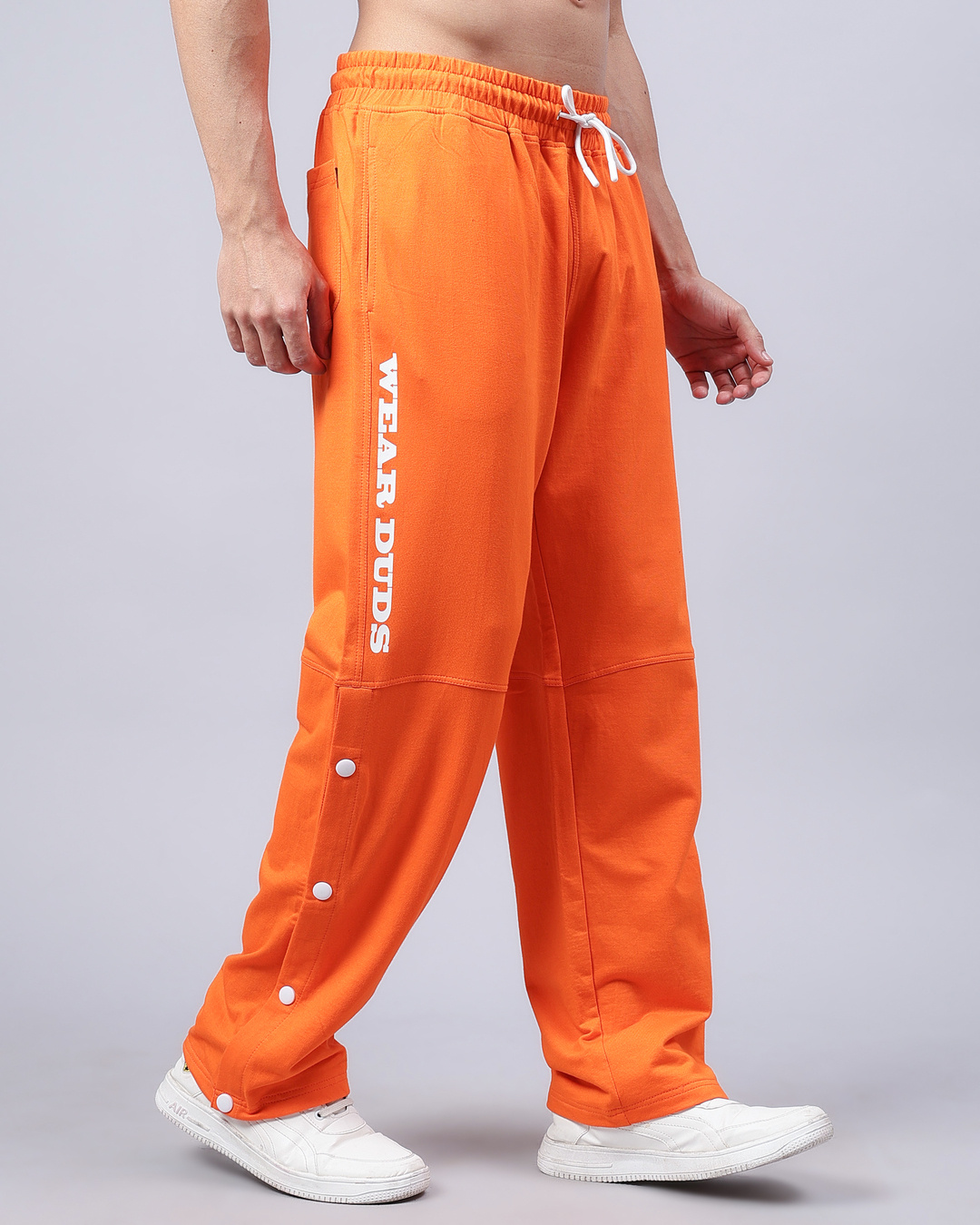 Buy Men's Orange Typography Relaxed Fit Track Pants Online at Bewakoof