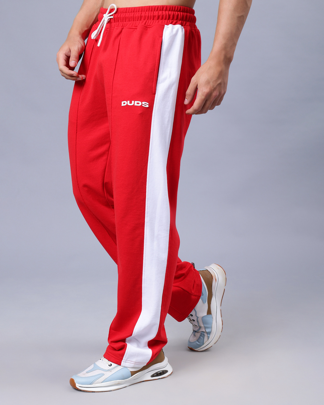 Buy Men's Red Striped Relaxed Fit Track Pants Online at Bewakoof