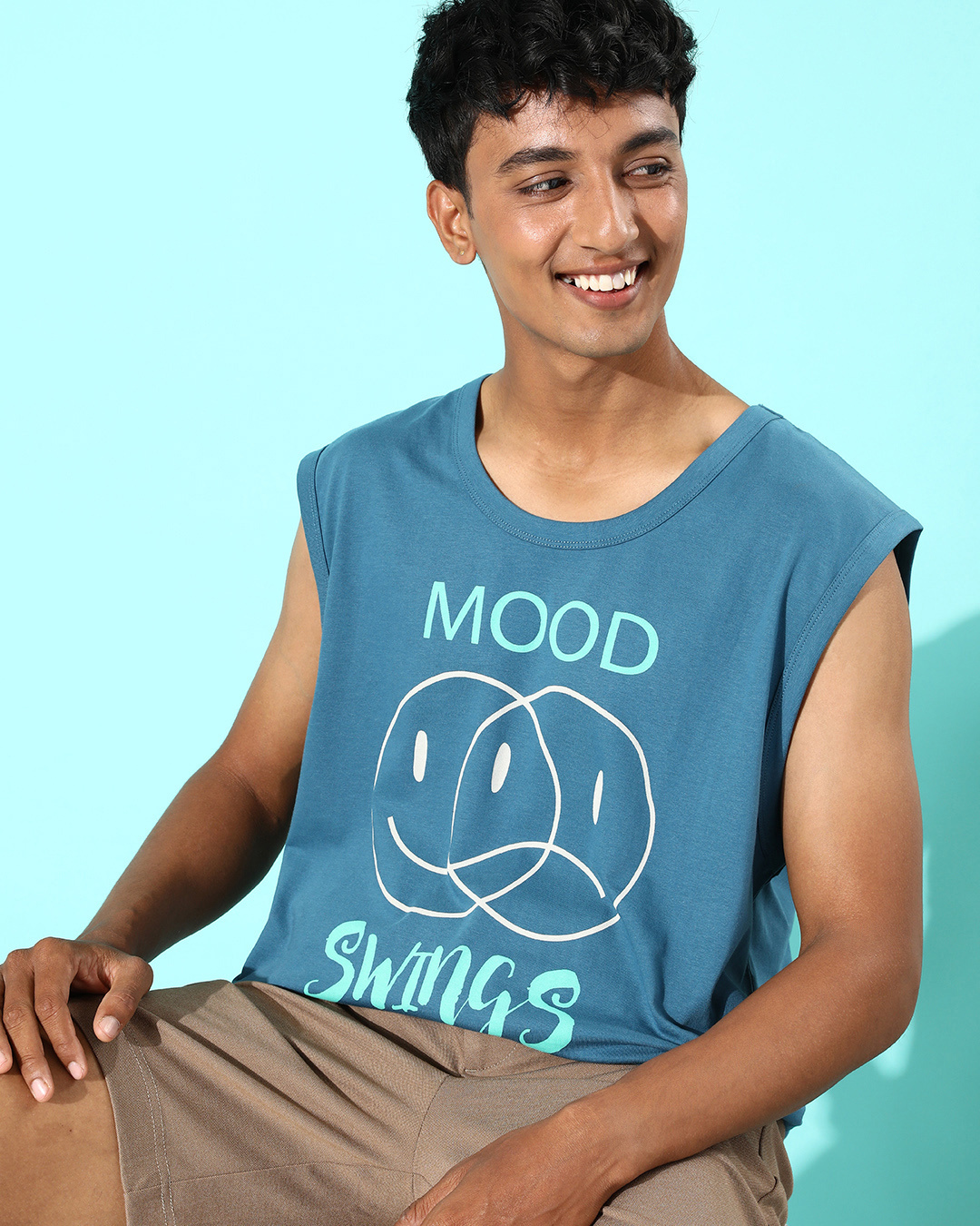 Buy Men's Teal Blue Graphic Printed Oversized Vest Online at Bewakoof