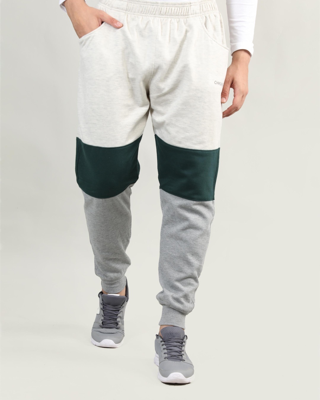 Buy Men's White & Green Color Block Track Pants Online at Bewakoof