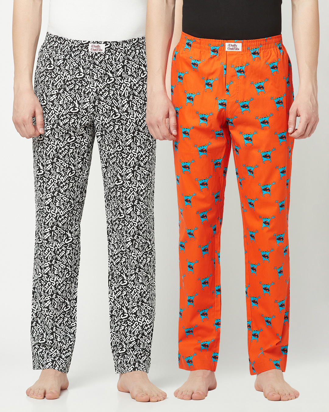 Buy Pack of 2 Men's Black & Orange All Over Printed Pyjamas Online in ...
