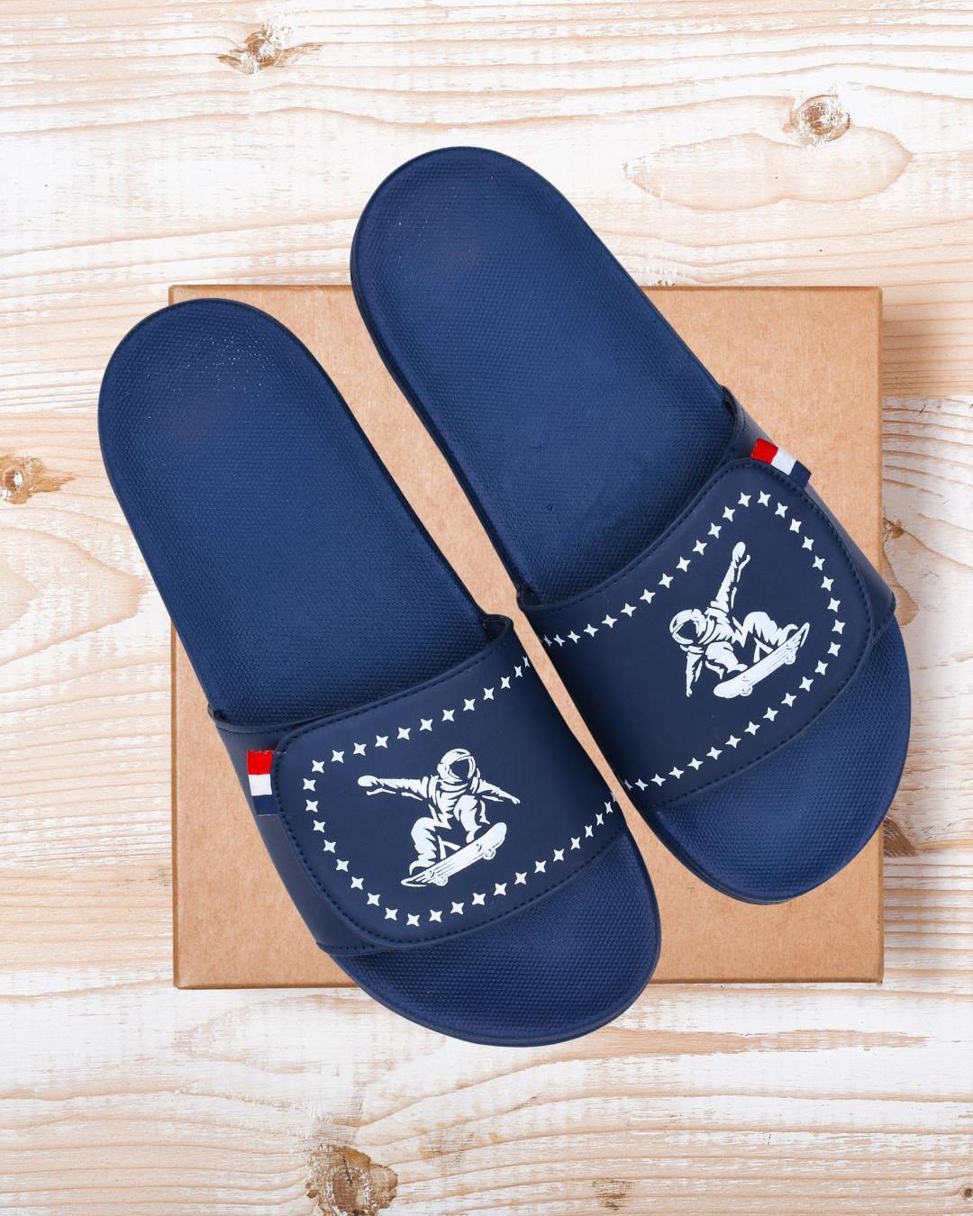 Buy Men's Blue Astronaut Printed Adjustable Strap Sliders Online in ...