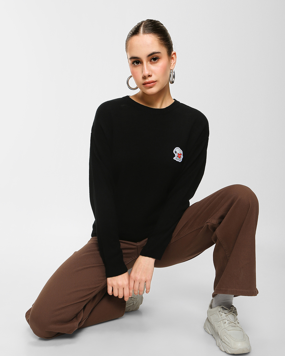 Buy Women's Black Printed Oversized Sweater Online at Bewakoof