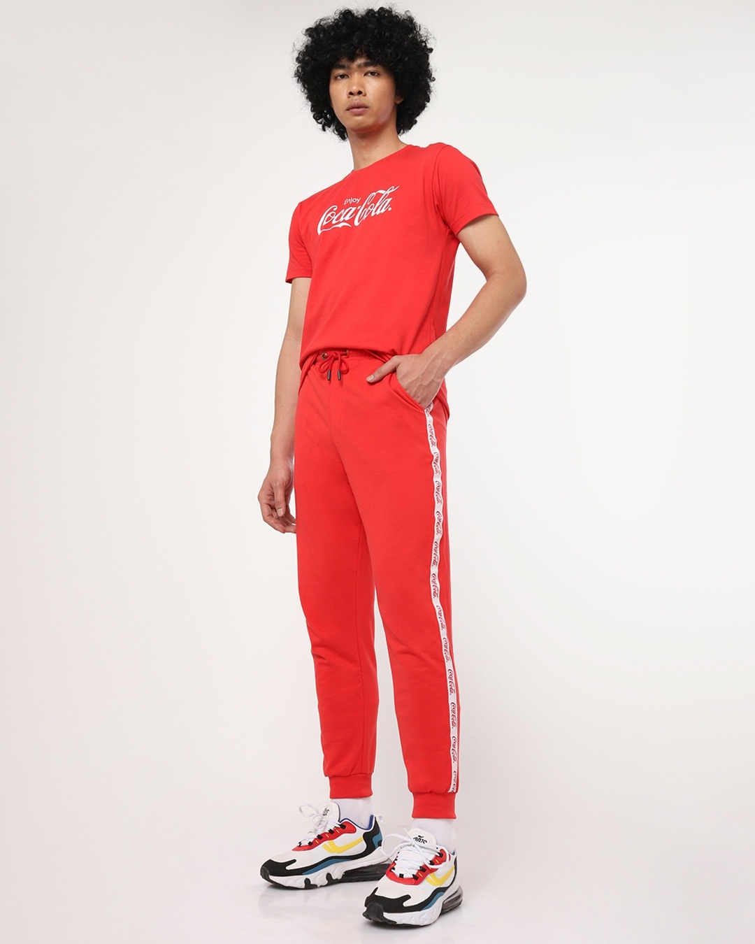 Buy Coca Cola Tape Jogger for Men Aura Orange Online at Bewakoof