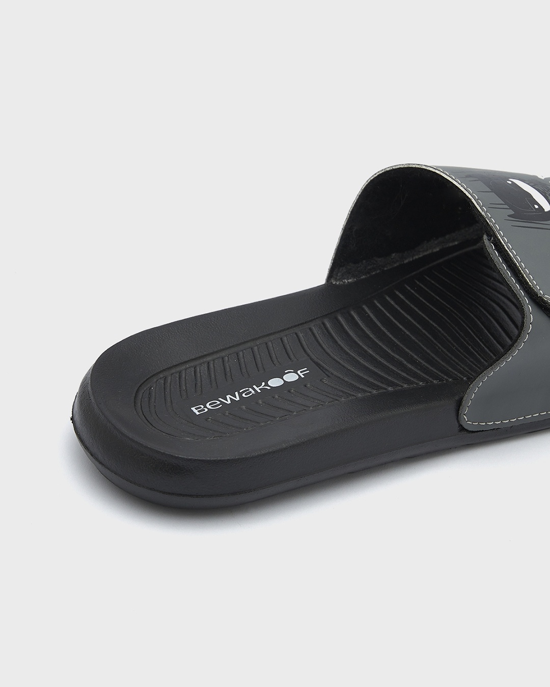 Buy Men's Black Batman Chibi Printed Sliders Online in India at Bewakoof