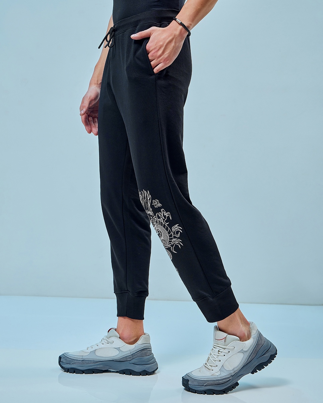 Buy Men's Black Firece Printed Super Loose Fit Joggers Online at Bewakoof