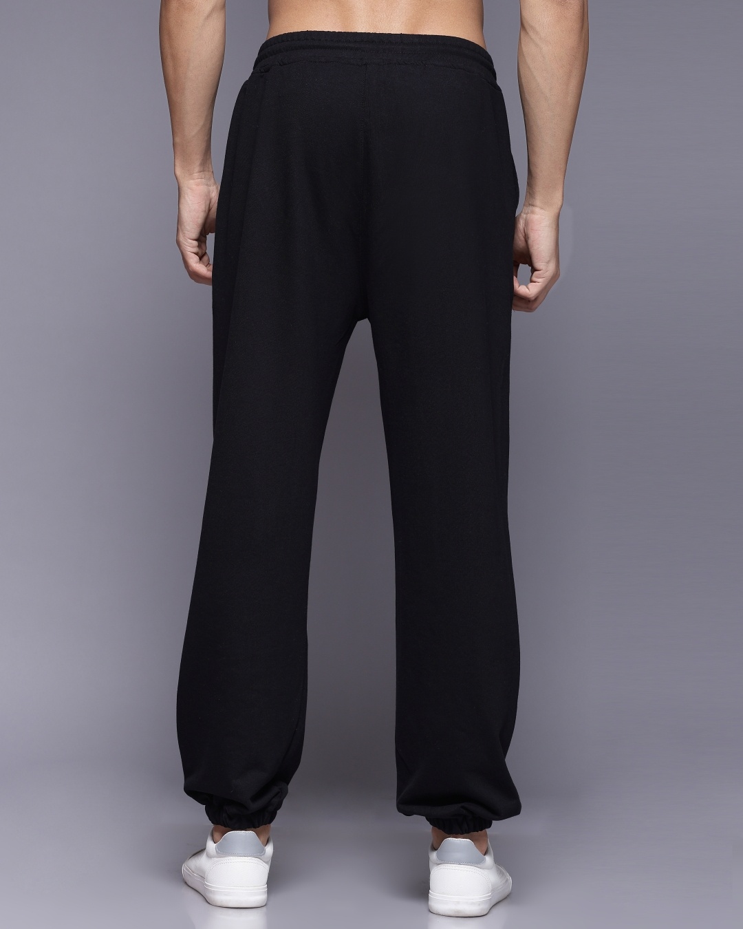 Buy Men's Black Graphic Printed Relaxed Fit Joggers Online at Bewakoof