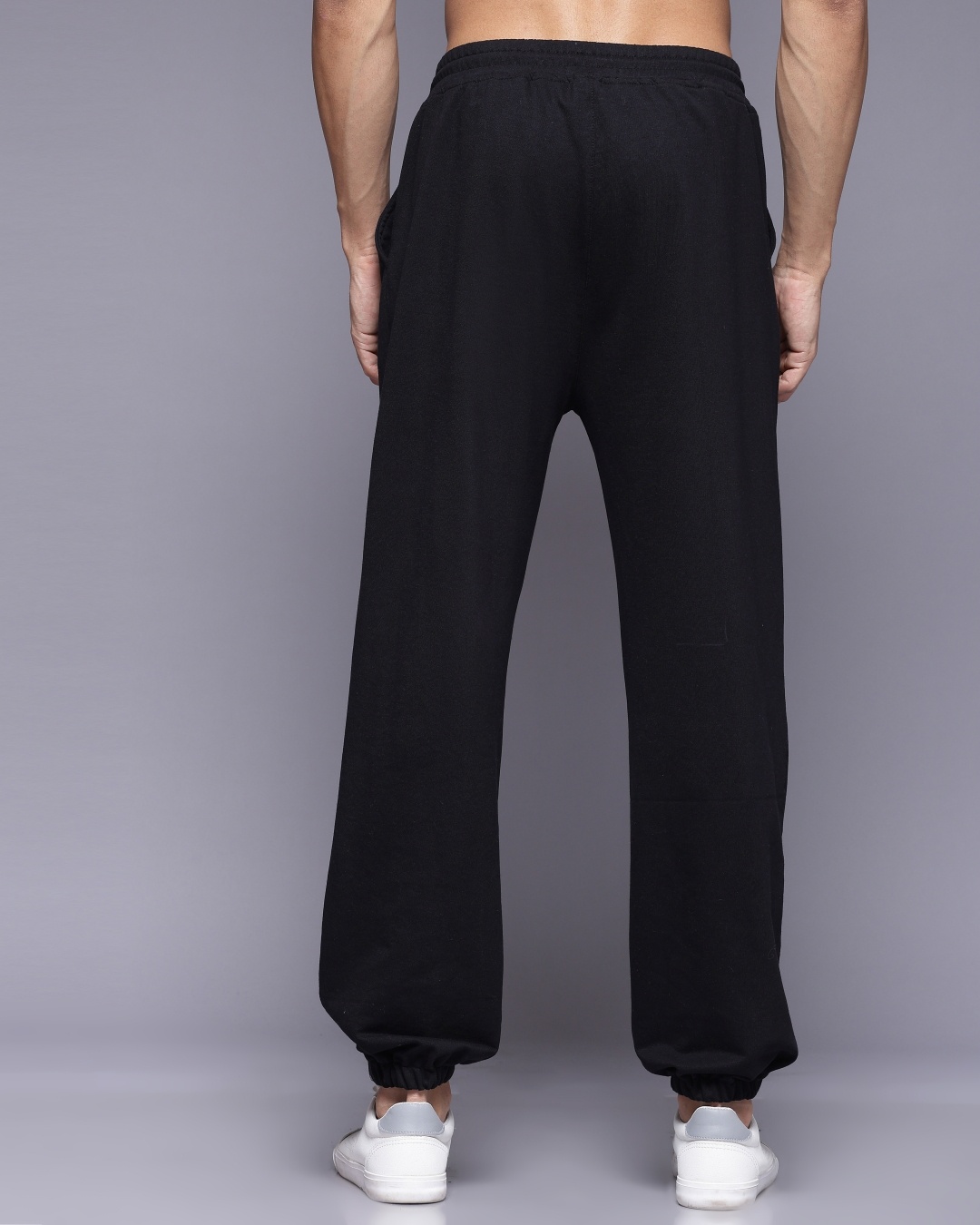 Buy Men's Black Graphic Printed Relaxed Fit Joggers Online at Bewakoof