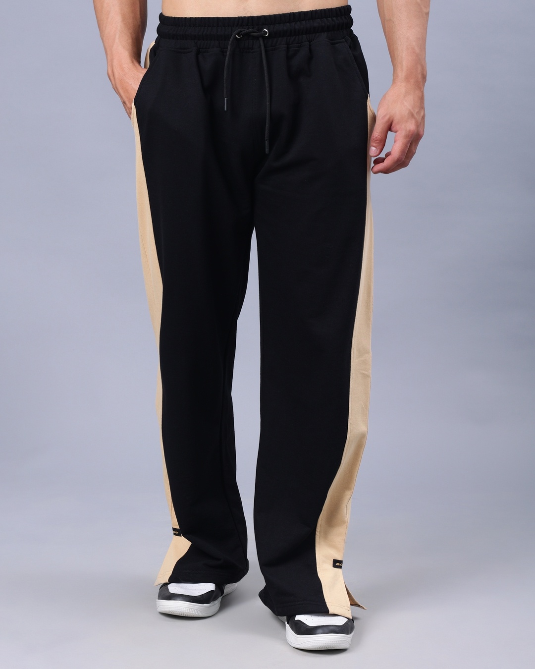 Buy Men's Black Striped Relaxed Fit Track Pants Online at Bewakoof