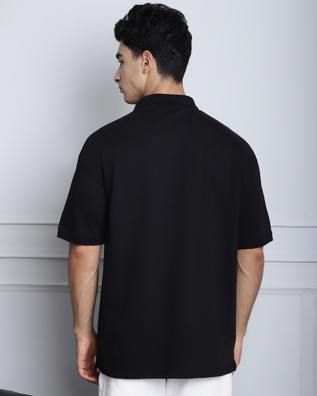 Buy Men's Black Typography Oversized Polo T-shirt Online at Bewakoof