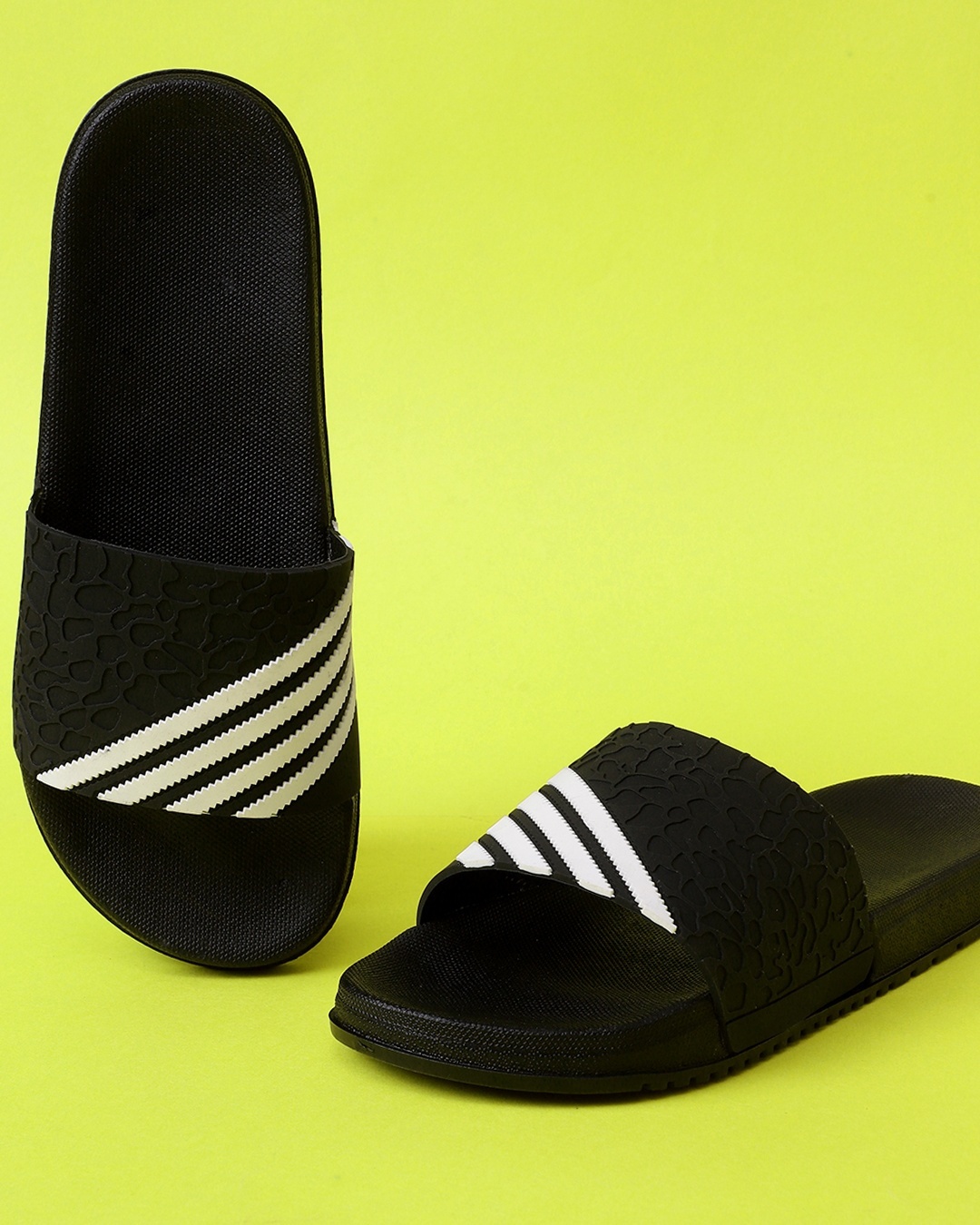 Buy Pampy Angel Men's Black Striped Sliders Online in India at Bewakoof